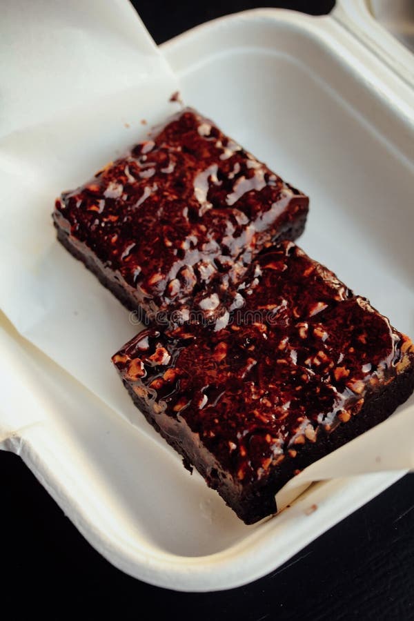 Two Chocolate Brownies on Paper Box Container Stock Photo - Image of ...