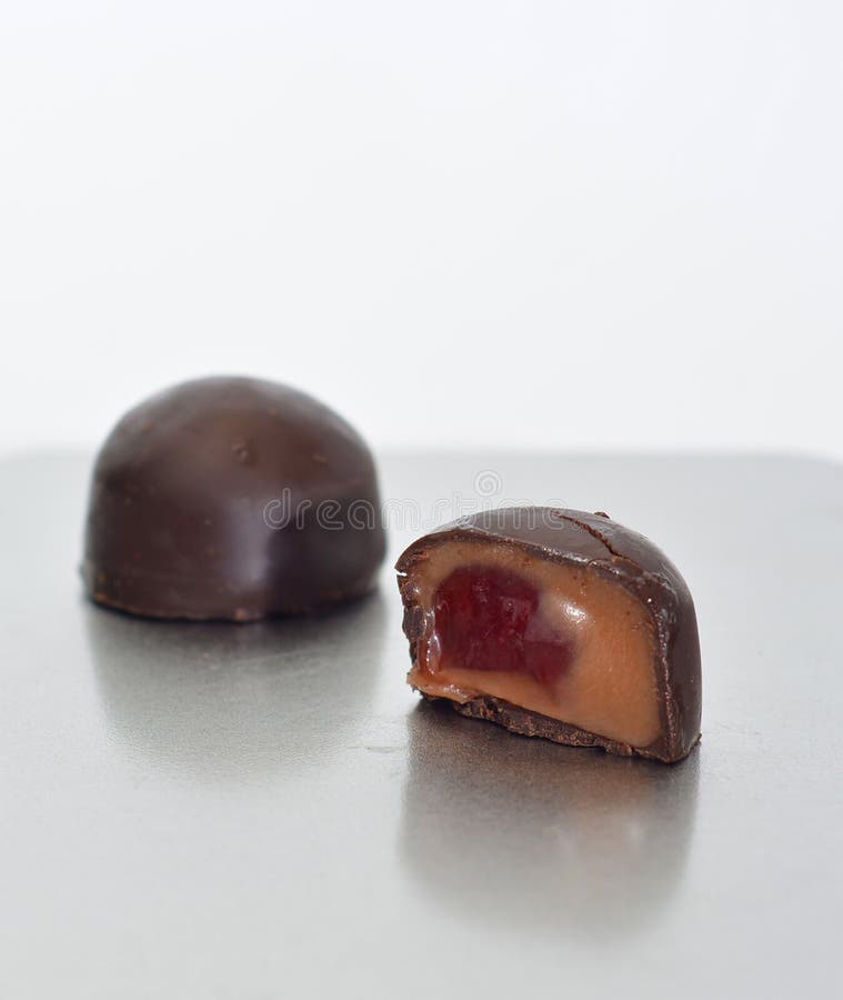 Two chocolate candies stock photo. Image of dessert, metal - 88630442