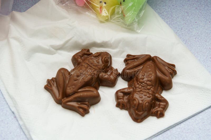 Two Chocolate Frogs on a Napkin Stock Photo - Image of sweet, dessert ...