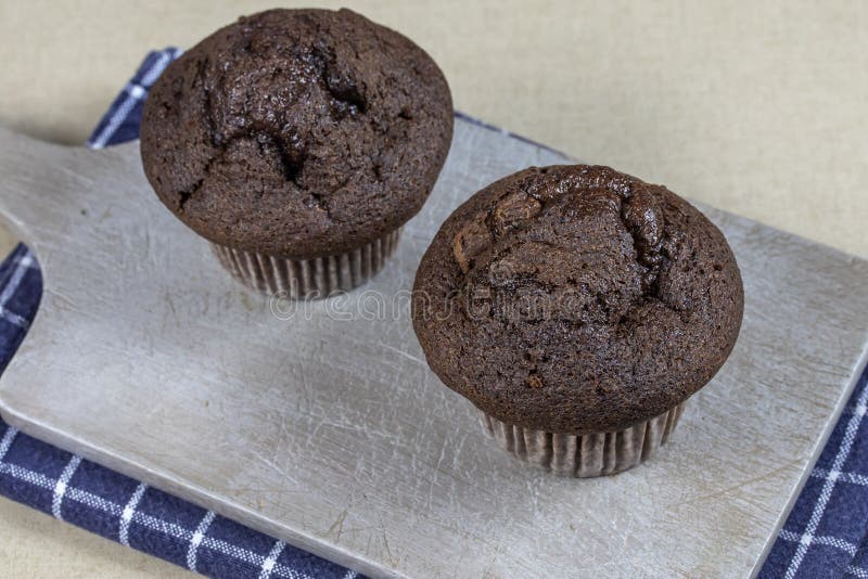 Chocolate Muffin on a Table Stock Photo - Image of baked, table: 182243876