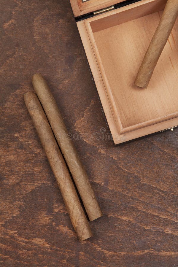 Two cigars and a box stock photo. Image of rolled, wealth - 40604606