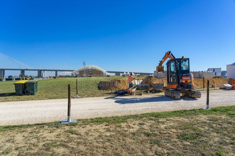 Two Civil Construction Workers and Industrial Machinery in the ...