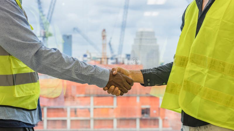Two Civil Engineers Having Handshake Together Stock Image - Image of ...