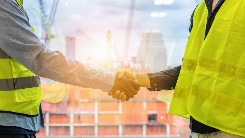 Two Civil Engineers Having Handshake Together Stock Image - Image of ...