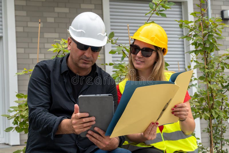 Two Civil Engineers at Work Stock Image - Image of female, engineering ...