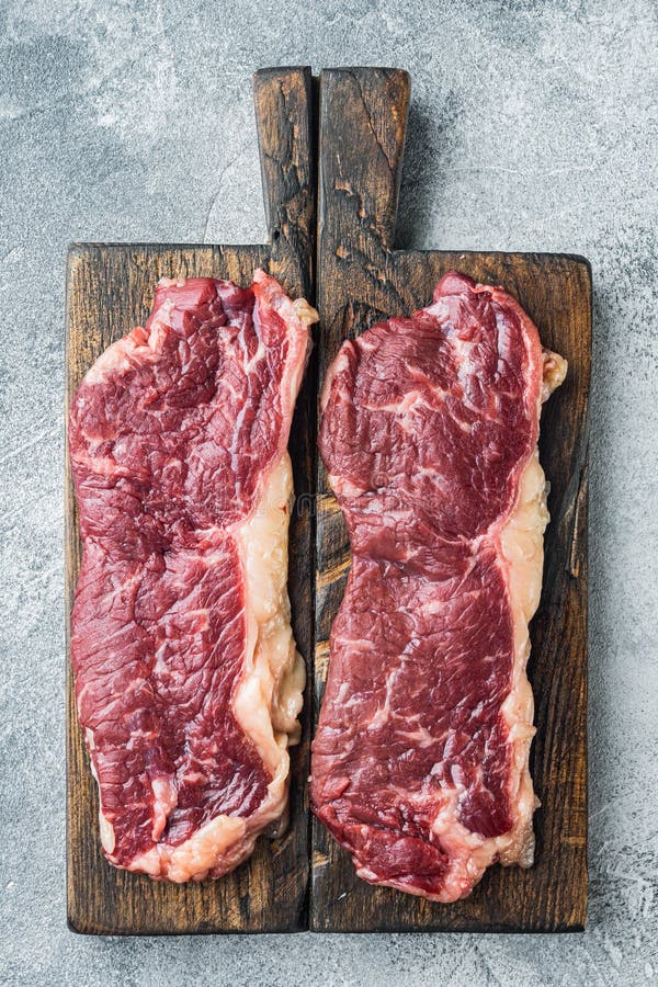 Two Classic Fresh Beef Steaks, on Gray Background, Top View Flat Lay ...