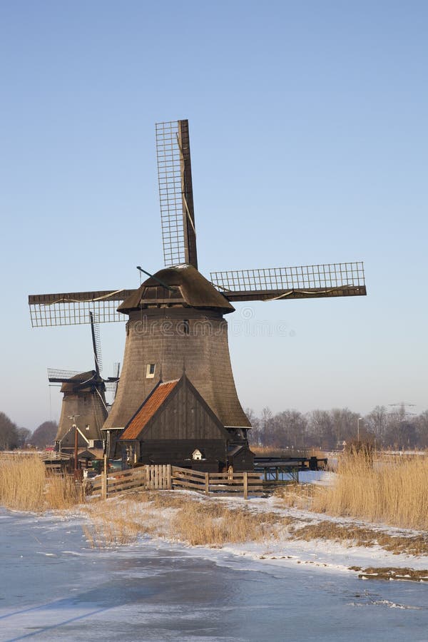 Two classic windmills stock photo. Image of vintage, river - 38559384