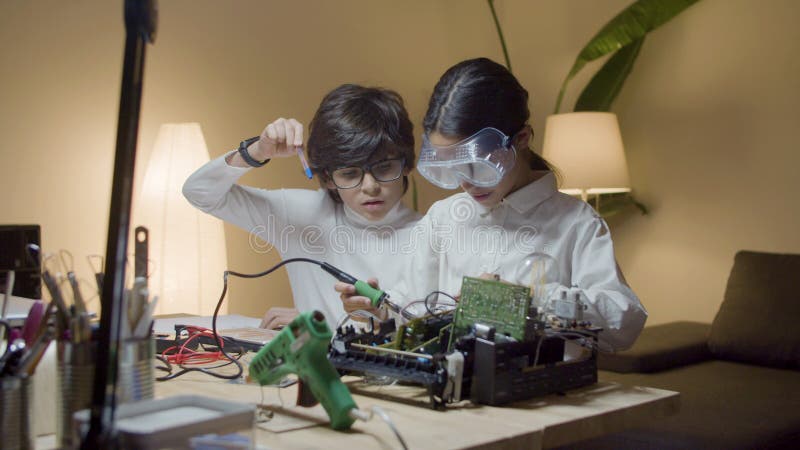 Two Classmates Doing School Project Together in the Evening Stock Video ...