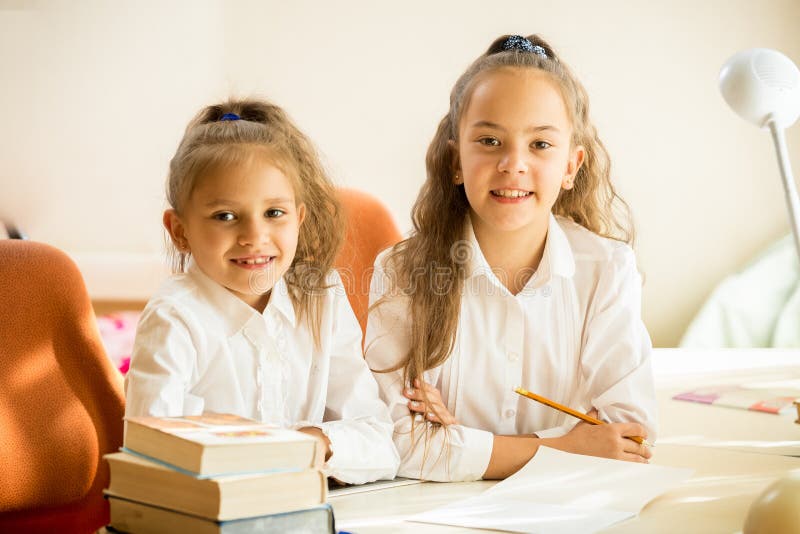 Two Classmates Sitting at Desk and Smiling Stock Image - Image of learn ...