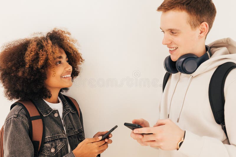Two Classmates Standing Next To Each Other and Studying Stock Image ...