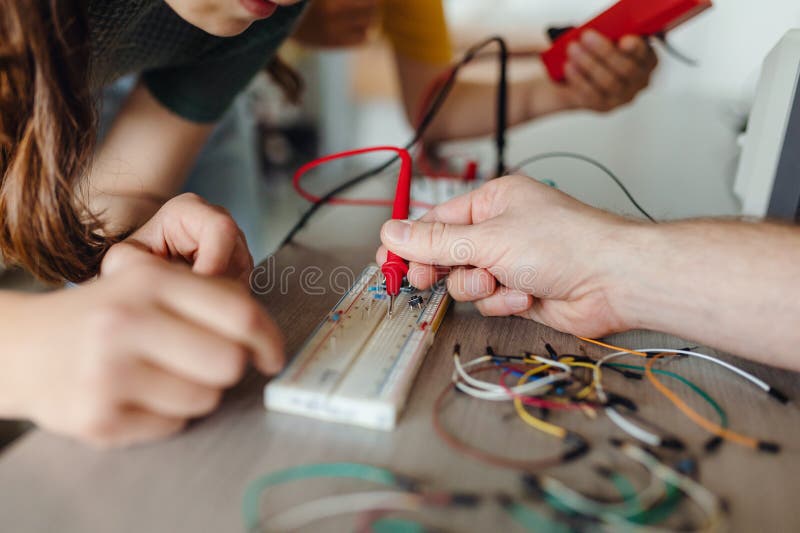 Two Classmates Working Together on Circuit Board, Building Robot in ...