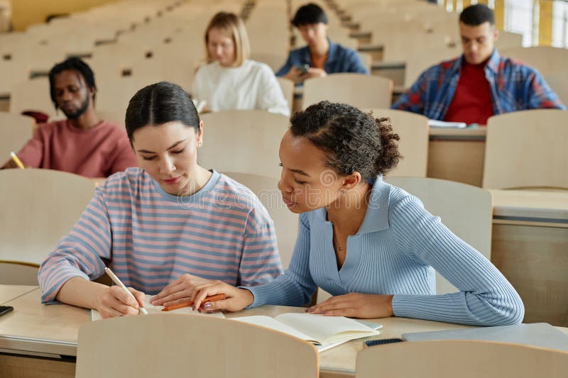 Students Doing Work in Team Stock Photo - Image of teamwork, college ...