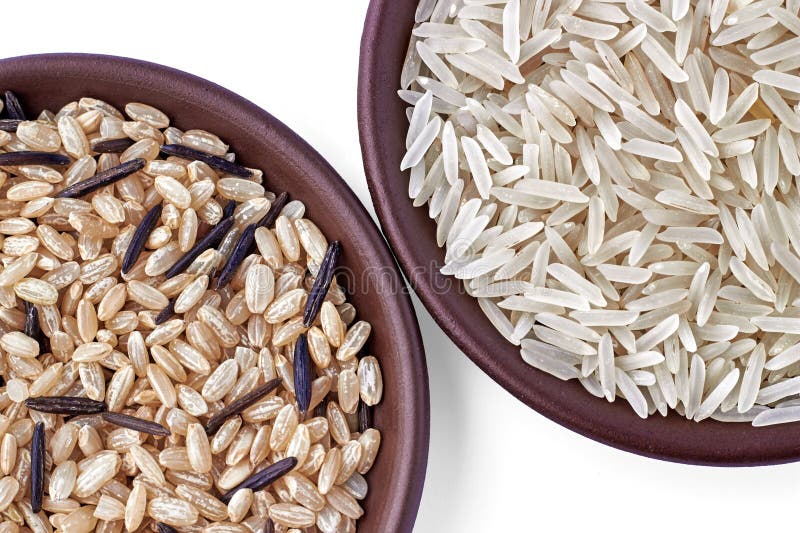 Two Clay Bowls of White Basmati Rice and Coarse Brown Black Rice. Top ...