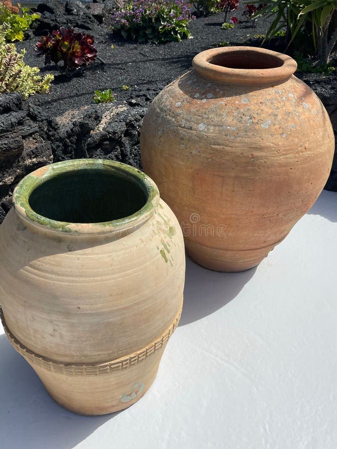 Clay jugs on a table stock image. Image of traditional - 264103399