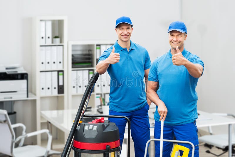 Two Male Cleaners Gesturing Thumbs Up Stock Image - Image of ...