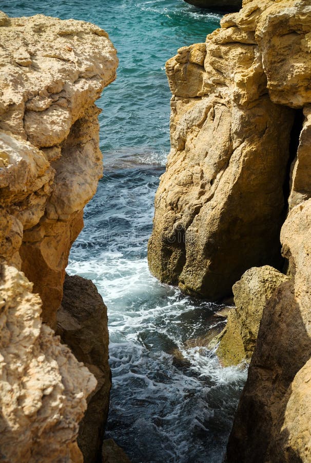 Two Cliffs and Rocks in Turquoise Waters of the Mediterranean Sea in ...