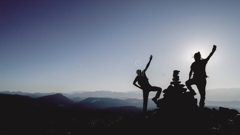 Two Climbers Successfully Complete the Summit and Pose Happily Stock ...