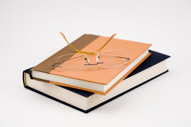 Two Closed Books and a Pair of Glasses Stock Image - Image of frames ...