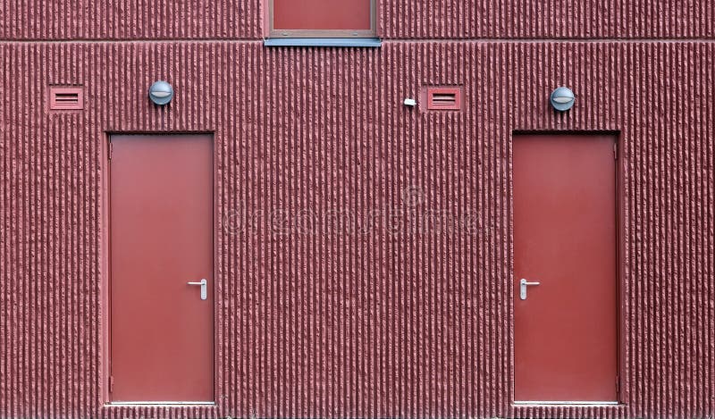 Two Closed Steel Doors in a Red Wall Stock Image - Image of brick ...