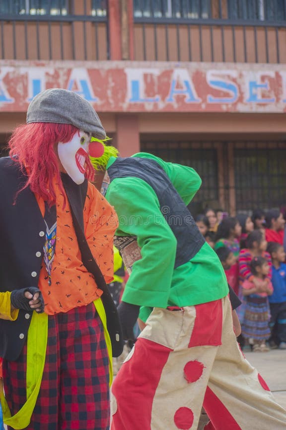 Two clowns with masks editorial stock image. Image of metal - 274422949