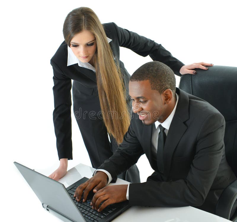 Two Co-Workers on Laptop stock photo. Image of smile - 31272930
