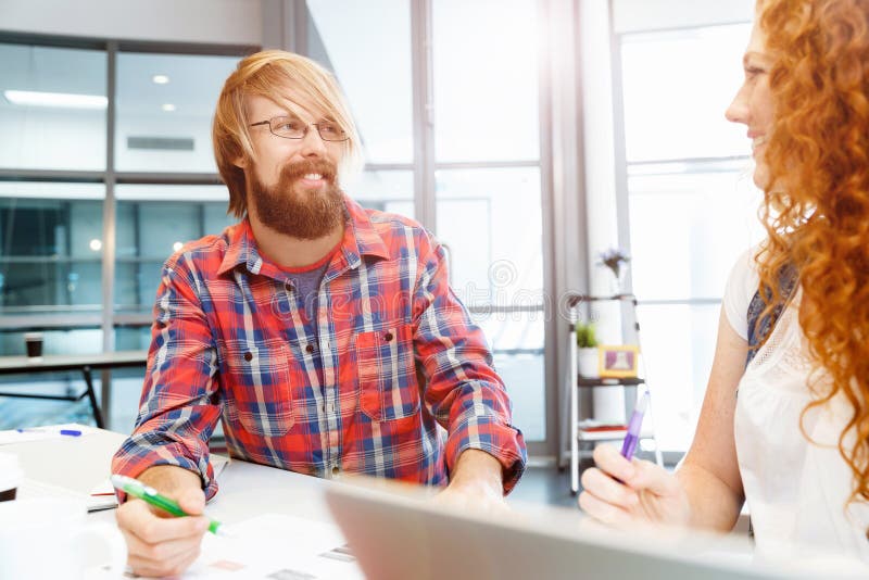 Two Co-workers Working Together Stock Photo - Image of designer ...