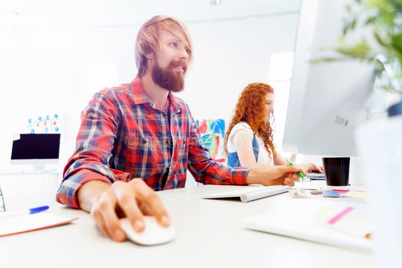 Two Co-workers Working Together Stock Image - Image of colleagues ...