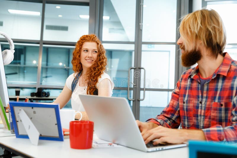 Two Co-workers Working Together Stock Image - Image of designer ...