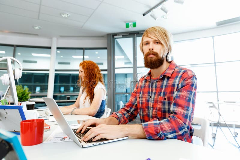 Two Co-workers Working Together Stock Photo - Image of team, computer ...