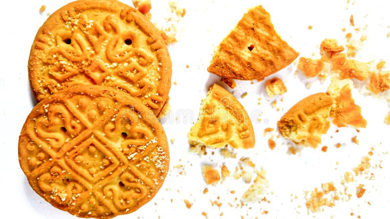 Two Coconut Flavored Biscuits and Their Crumbs Stock Photo - Image of ...