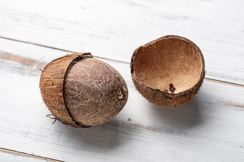 Two Coconuts are on a White Table Stock Image - Image of gourmet, brown ...