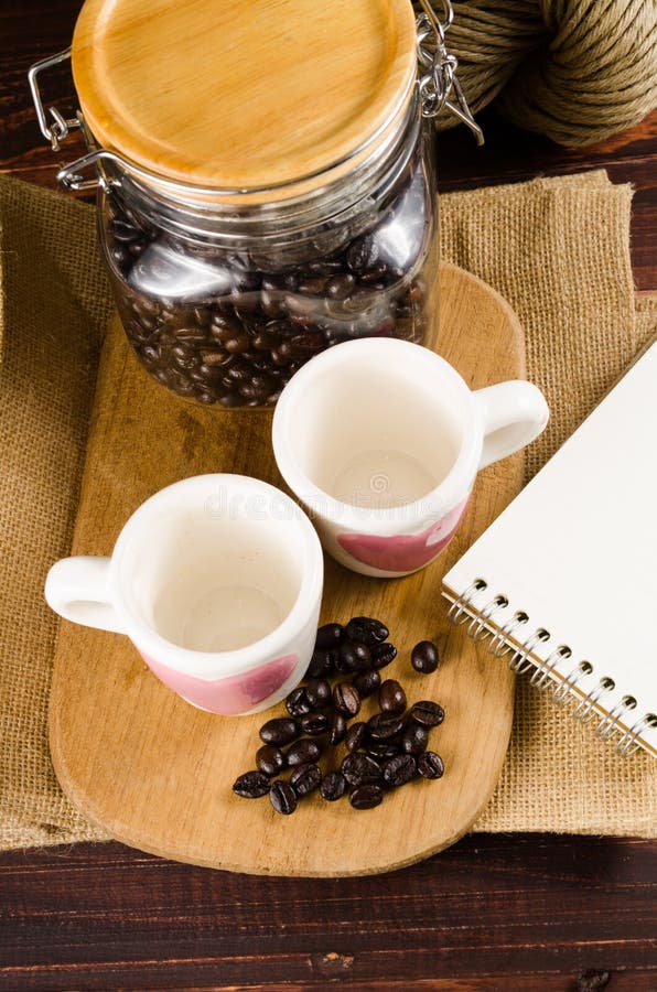 Two Coffee Cup on Wooden Board and Coffee Bottle with Back Backg Stock ...