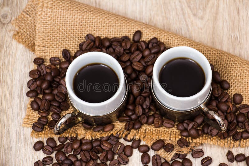 Two Coffee Cups with Coffee Beans Stock Image - Image of dark, drip ...
