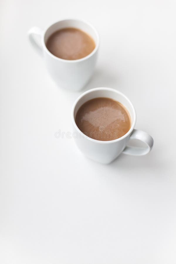 Two cups of black coffee stock image. Image of vertical - 6586375