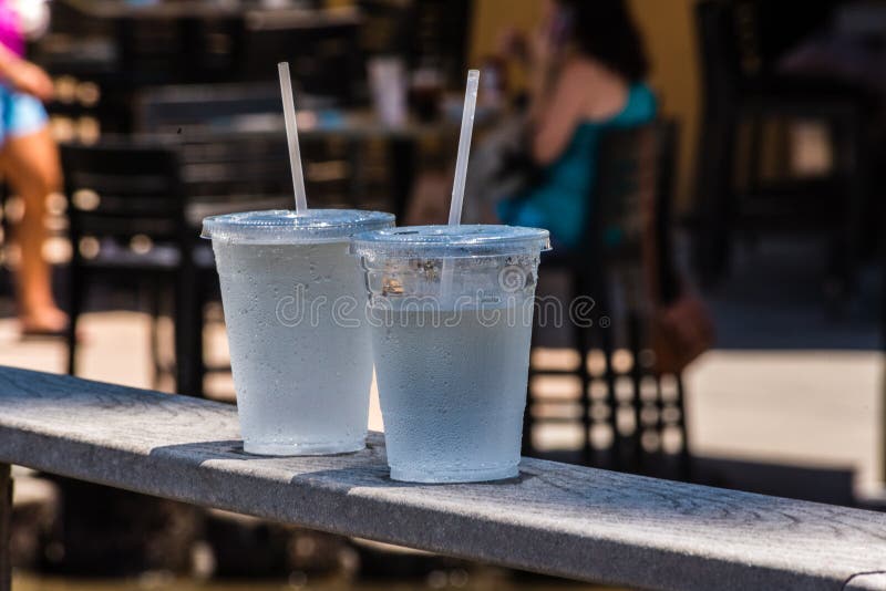 Two cold carbonated drinks stock image. Image of pouring - 74967727