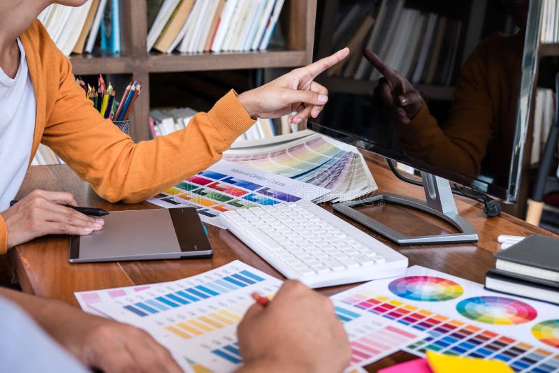Two Colleague Creative Graphic Designer Working on Color Selection and ...