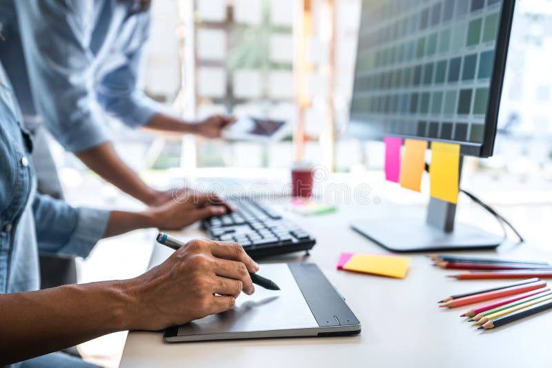 Two Colleague Creative Graphic Designer Working on Color Selection and ...