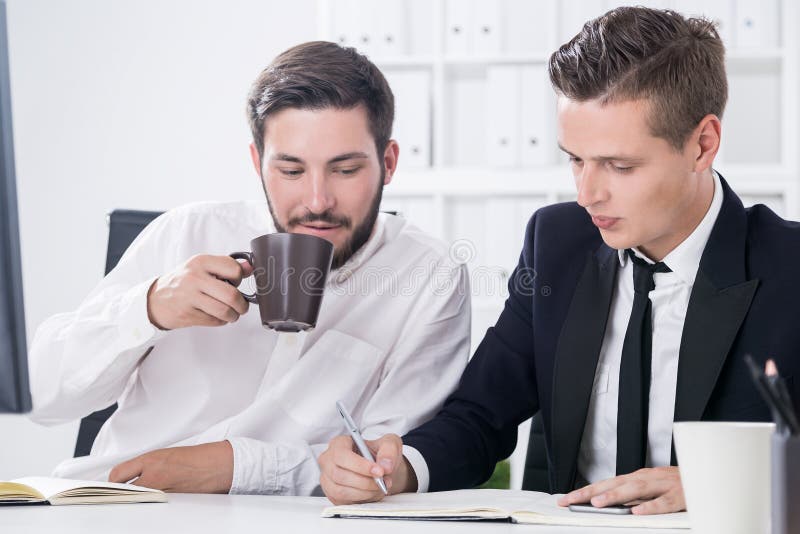 Two Colleagues with Coffee in Office Stock Image - Image of desk ...