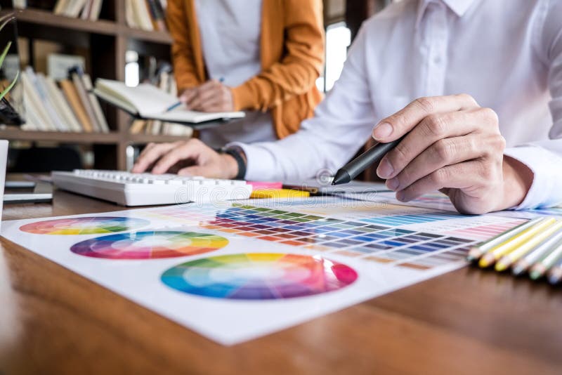 Two Colleagues Creative Graphic Designer Working on Color Selection and ...