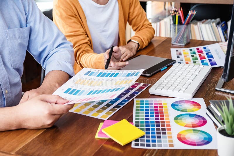 Two Colleagues Creative Graphic Designer Working on Color Selection and ...