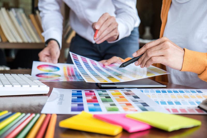 Two Colleagues Creative Graphic Designer Working on Color Selection and ...