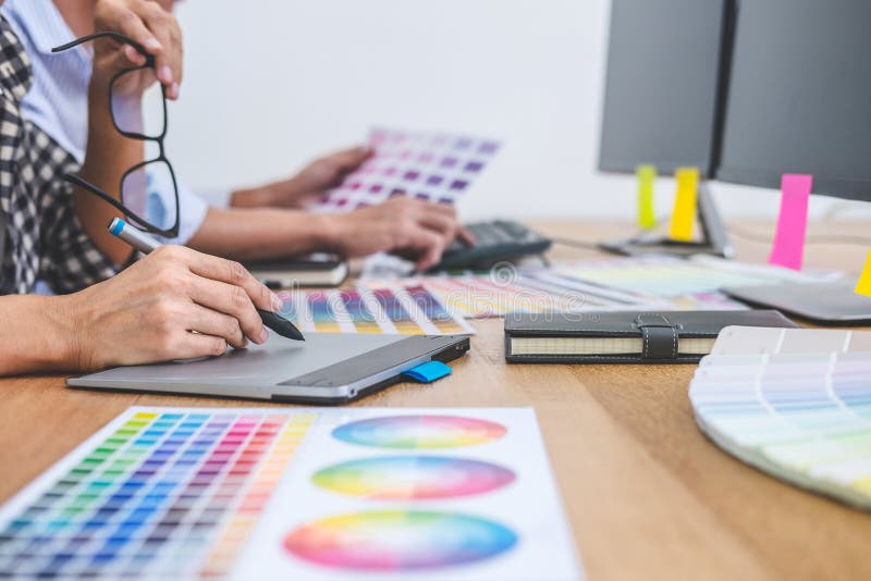Two Colleagues Creative Graphic Designer Working on Color Selection and ...