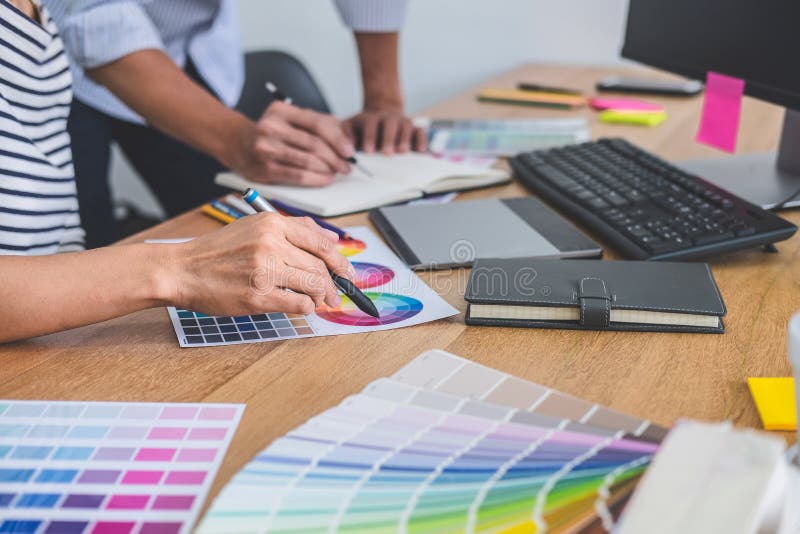 Two Colleagues Creative Graphic Designer Working on Color Selection and ...