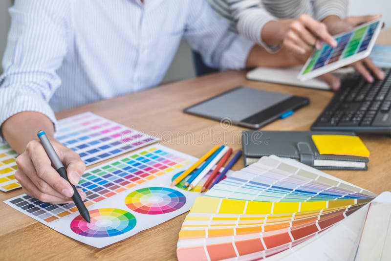 Two Colleagues Creative Graphic Designer Working on Color Selection and ...