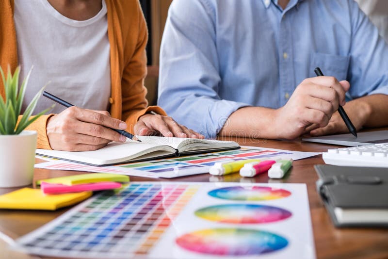 Two Colleagues Creative Graphic Designer Working on Color Selection and ...