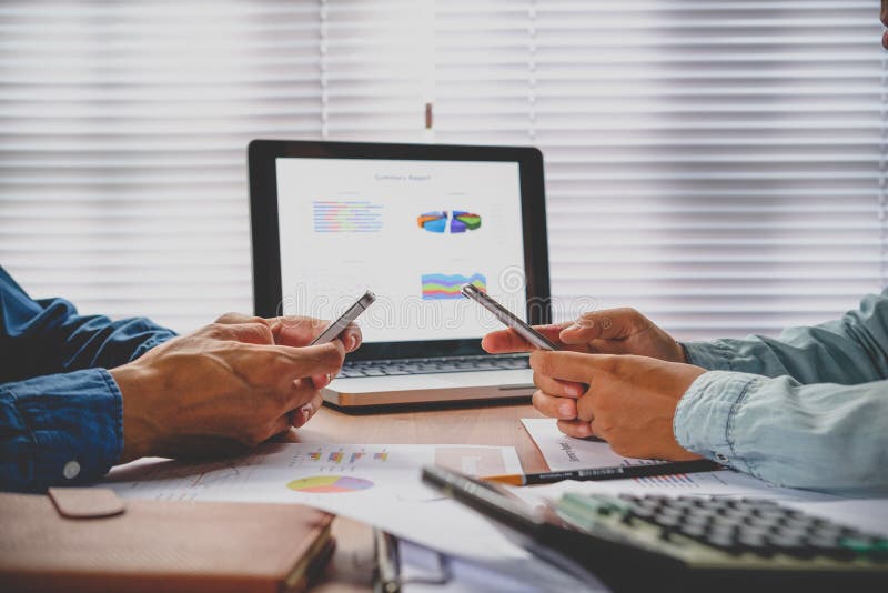 Two Colleagues Discussing Data Stock Photo - Image of computer, meeting ...