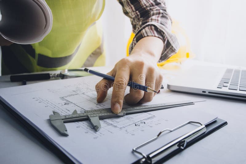 Two Colleagues Discussing Data Working and Tablet, Laptop with on on ...