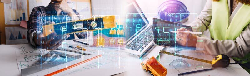 Two Colleagues Discussing Data Working and Tablet, Laptop with on on ...