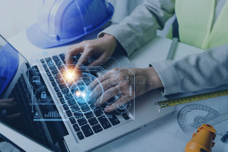 Two Colleagues Discussing Data Working and Tablet, Laptop with on on ...