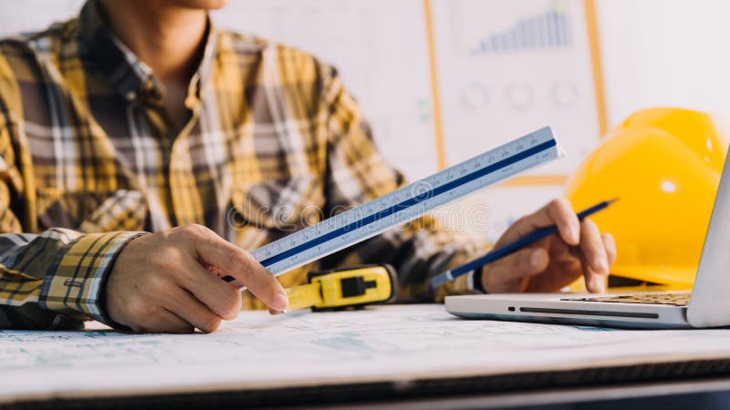 Two Colleagues Discussing Data Working and Tablet, Laptop with on on ...